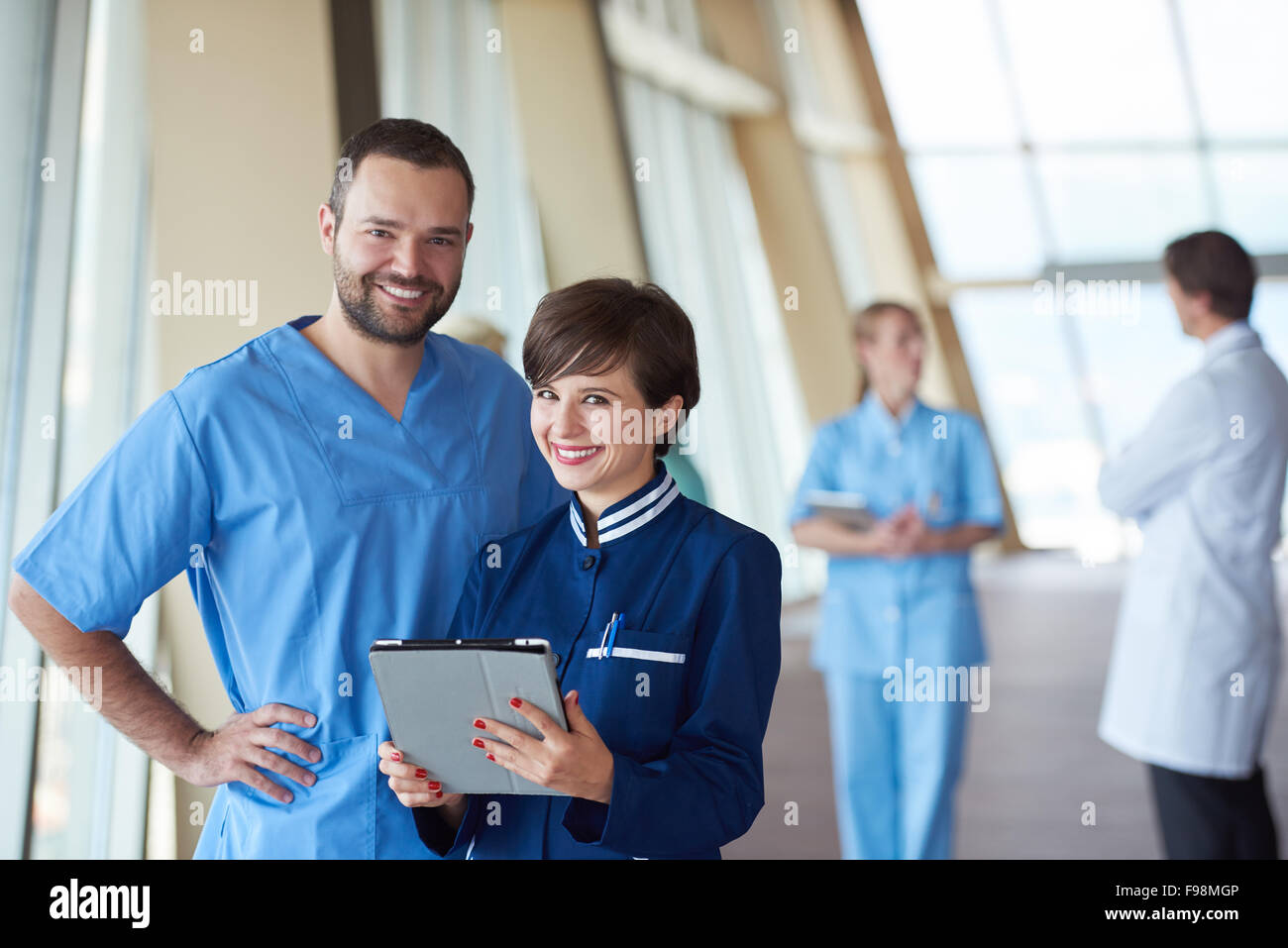 group of medical staff at hospital, doctors team standing together ...