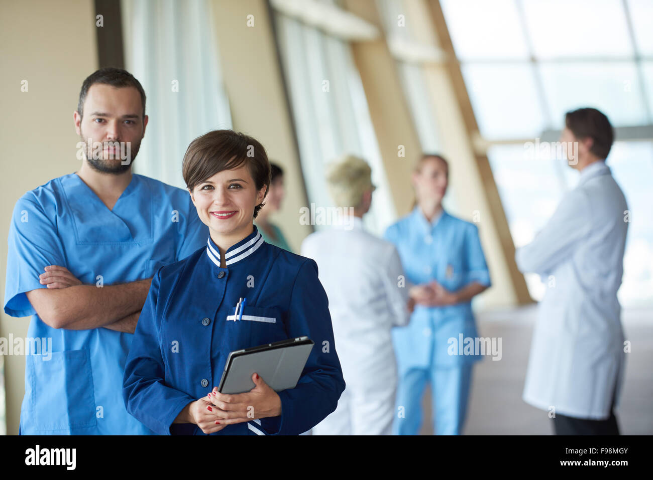 group of medical staff at hospital, doctors team standing together ...
