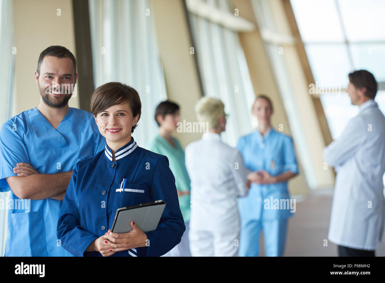 group of medical staff at hospital, doctors team standing together ...