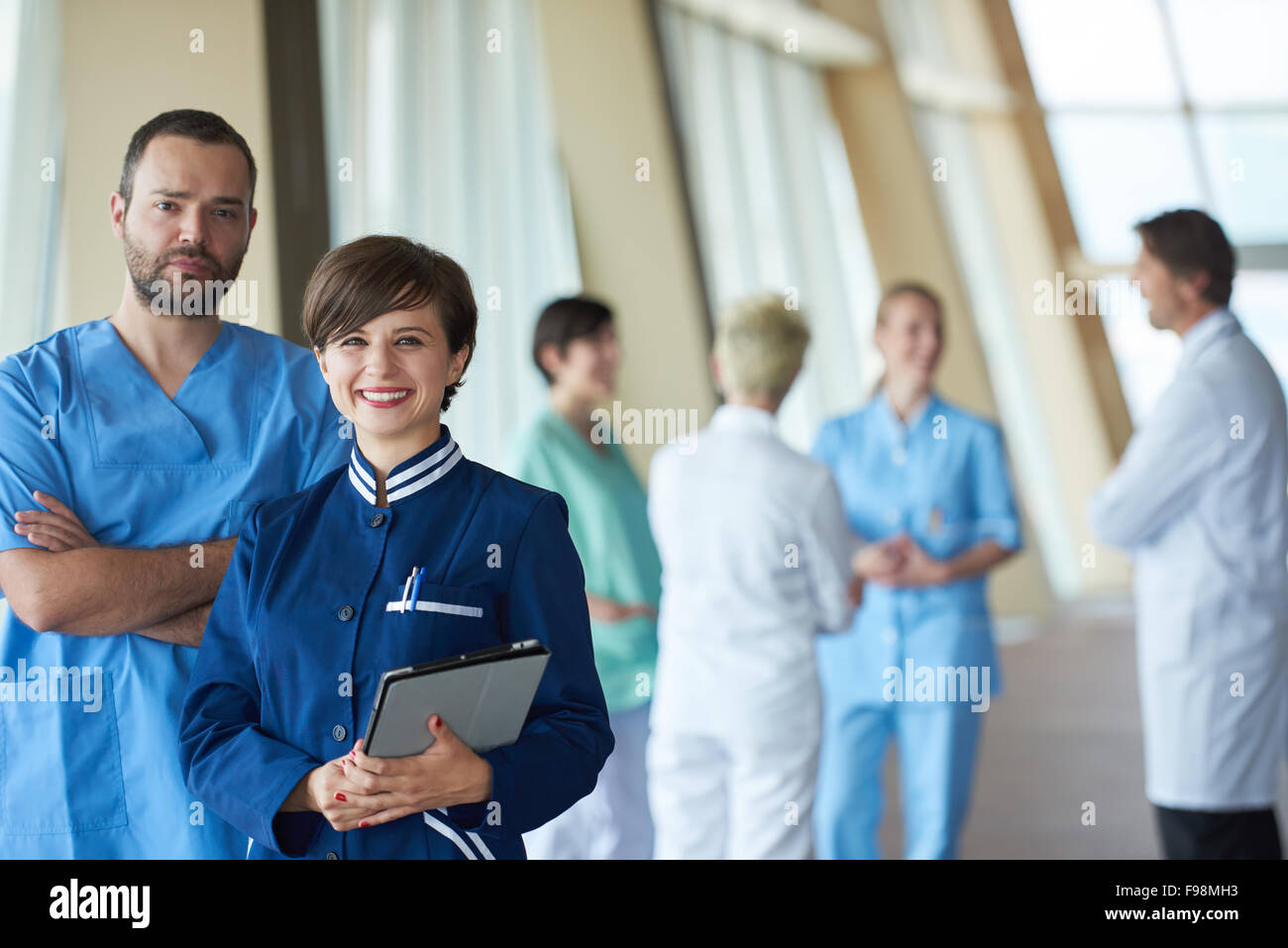 group of medical staff at hospital, doctors team standing together ...