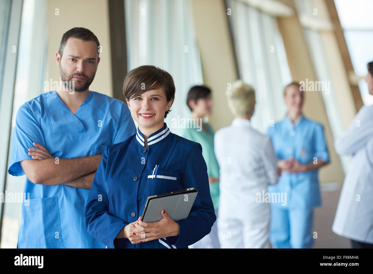 group of medical staff at hospital, doctors team standing together ...