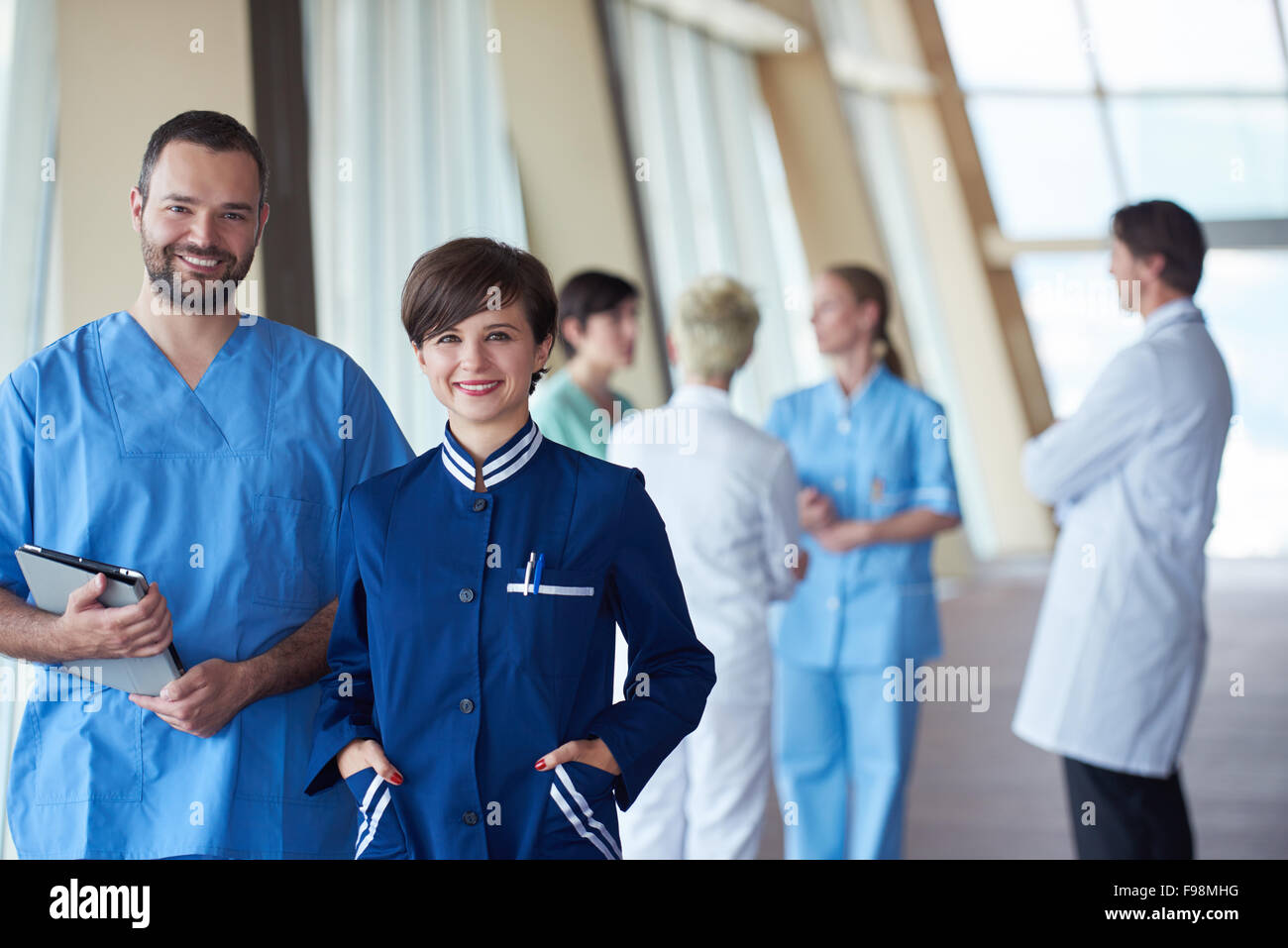 group of medical staff at hospital, doctors team standing together ...