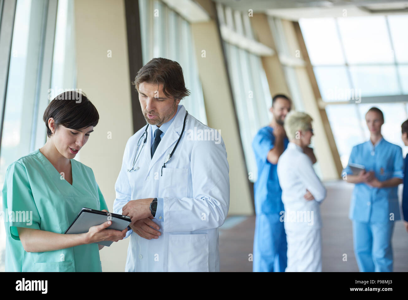 group of medical staff at hospital, doctors team standing together ...