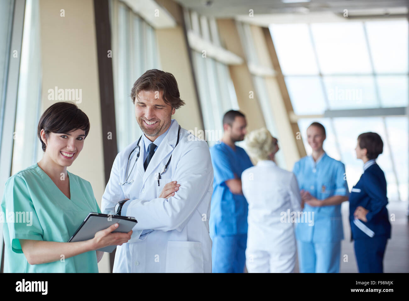 group of medical staff at hospital, doctors team standing together ...