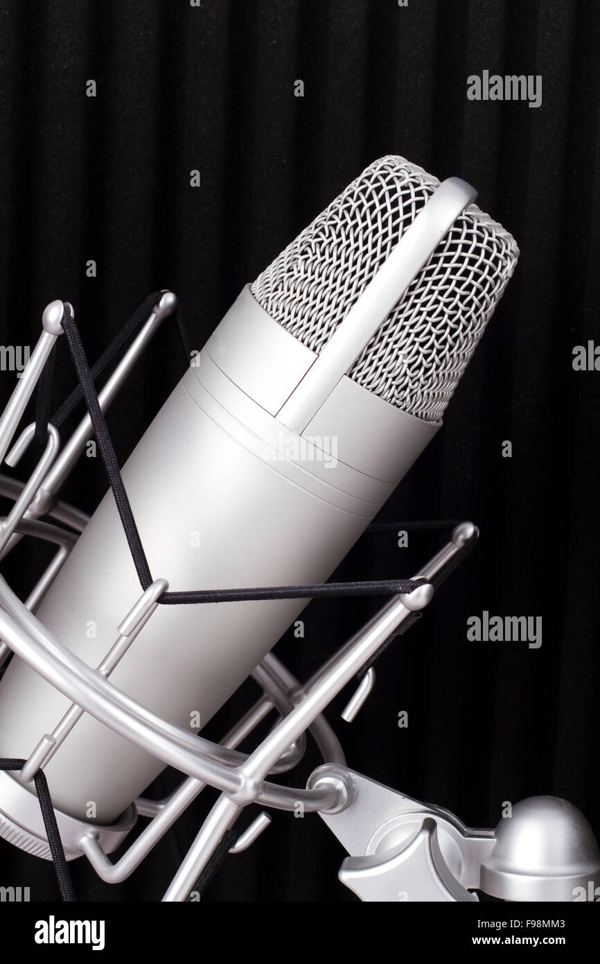 Professional studio microphone on white background Stock Photo - Alamy