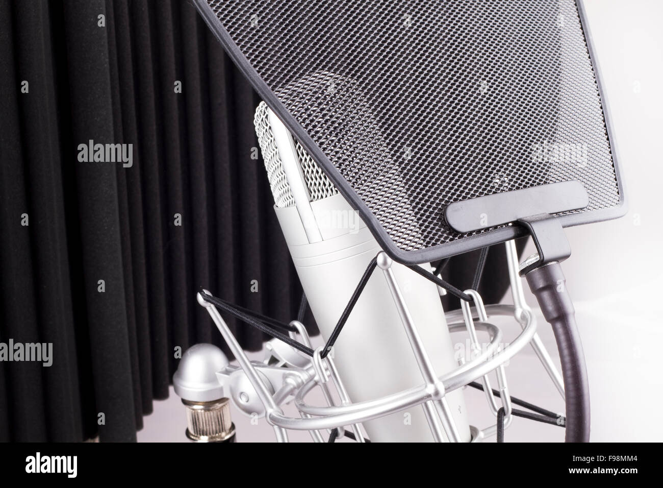 Professional studio microphone on white background Stock Photo - Alamy