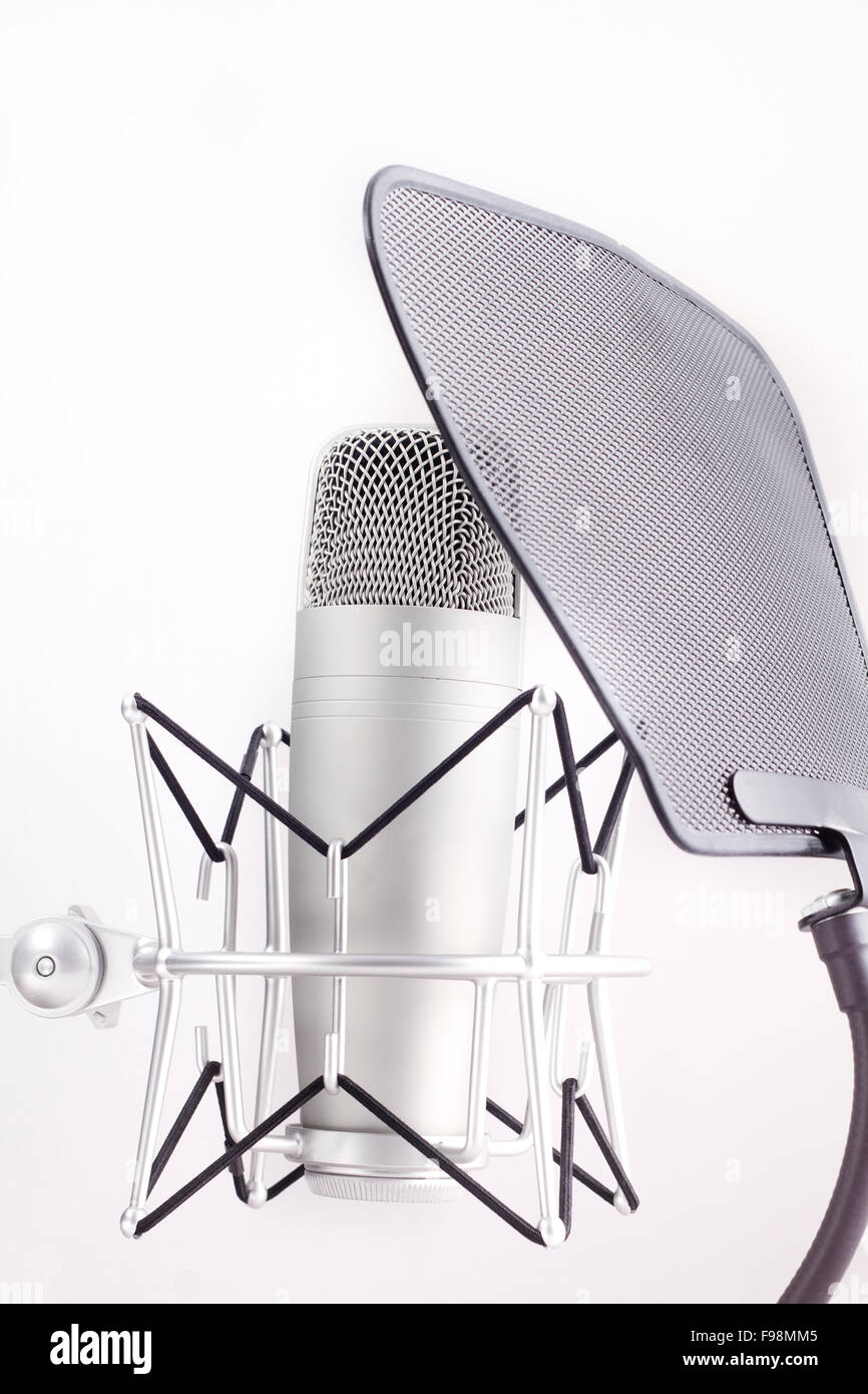 Professional studio microphone on white background Stock Photo - Alamy