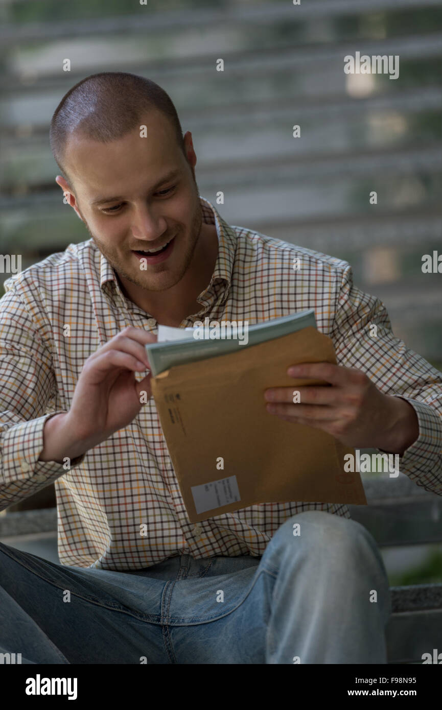 Caucasian male envelope hi-res stock photography and images - Alamy