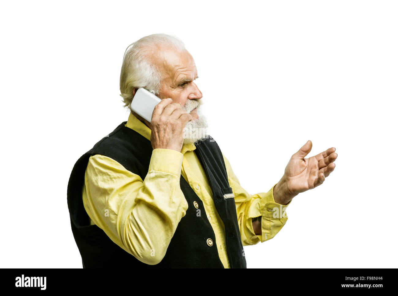 Old active bearded man calling with mobile phone isolated on white ...