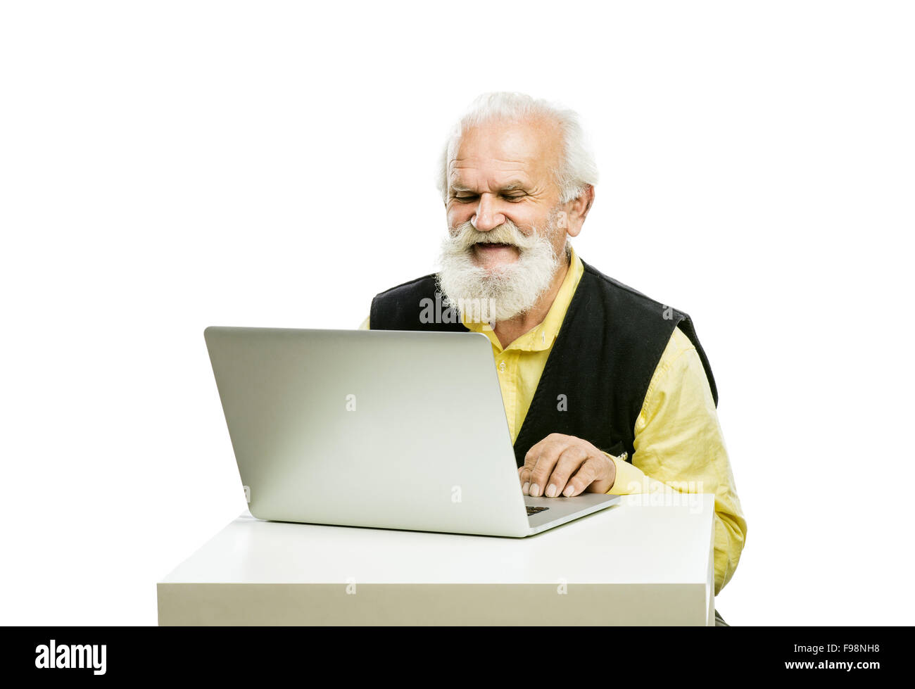 Old bearded man with laptop isolated on white background Stock Photo ...