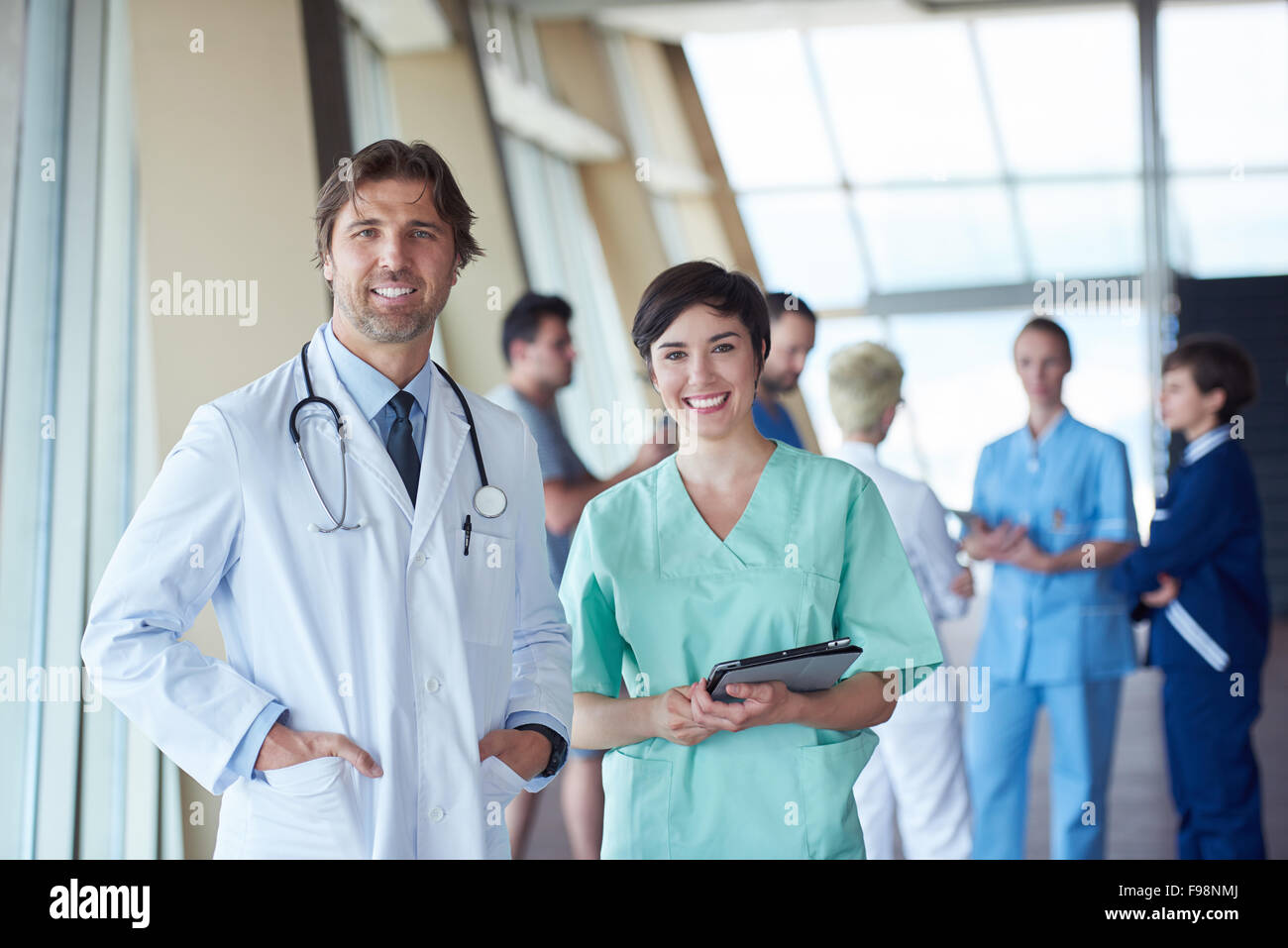 group of medical staff at hospital, doctors team standing together ...