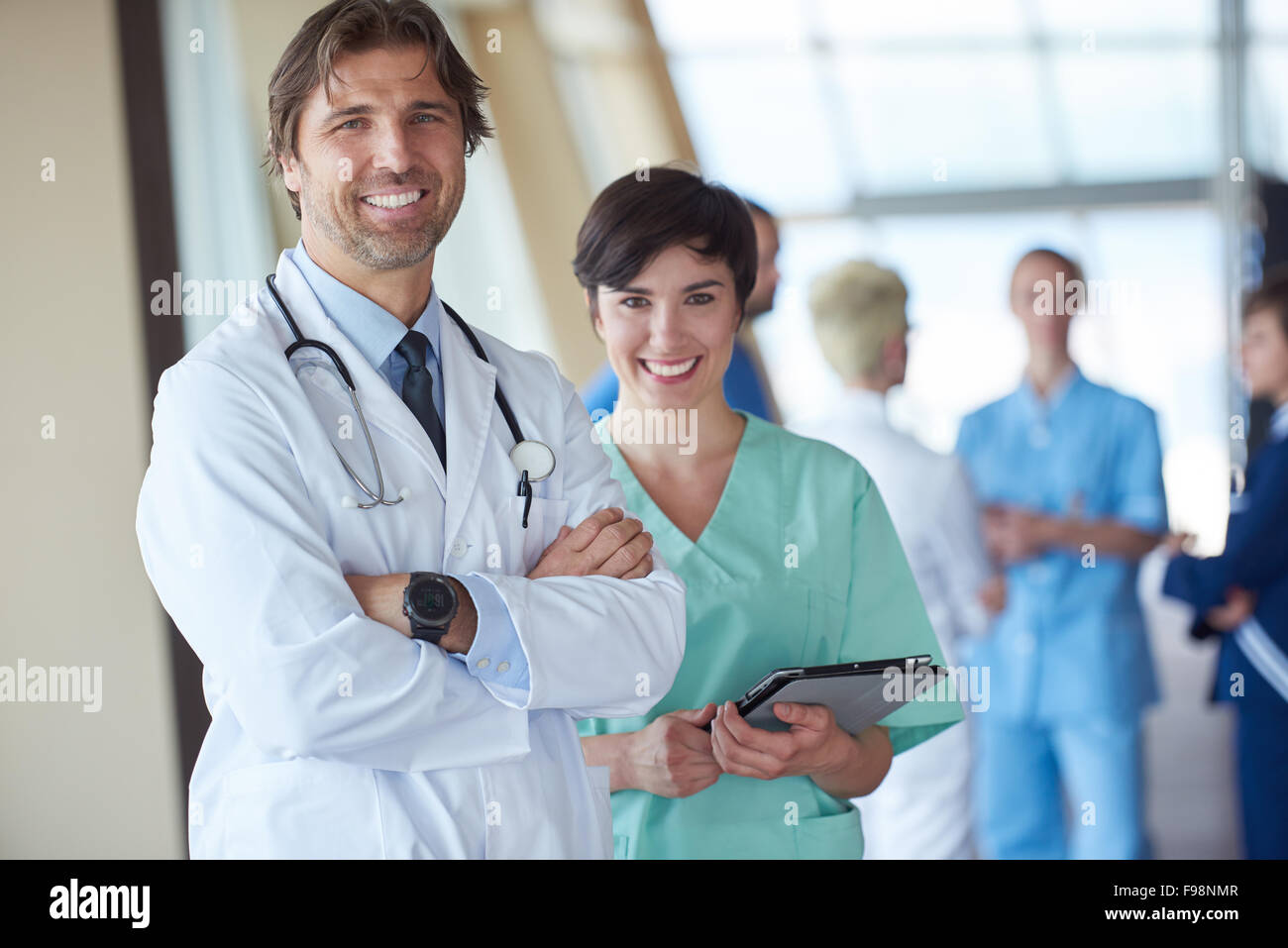 group of medical staff at hospital, doctors team standing together ...