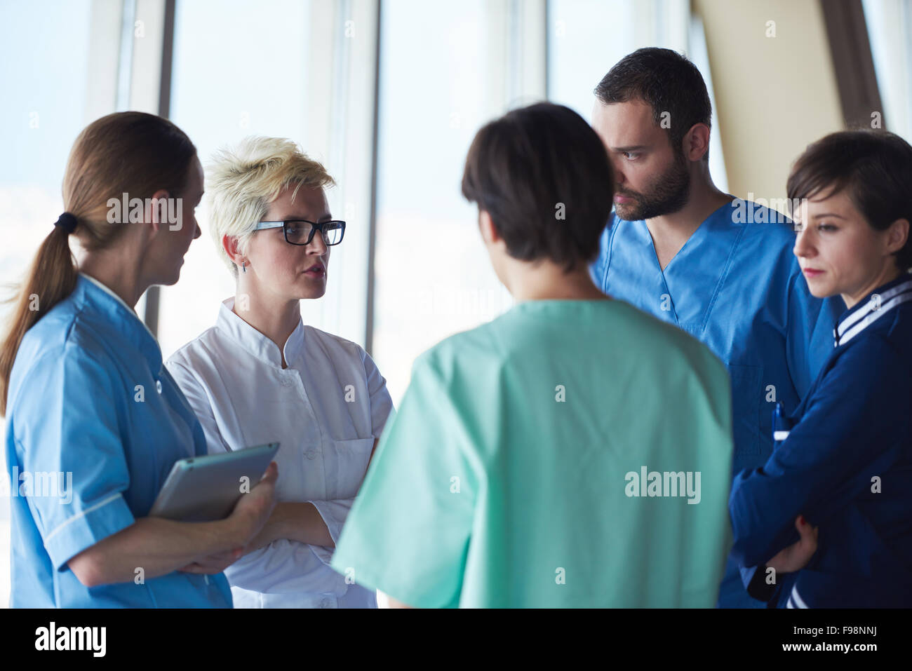 group of medical staff at hospital, doctors team standing together ...