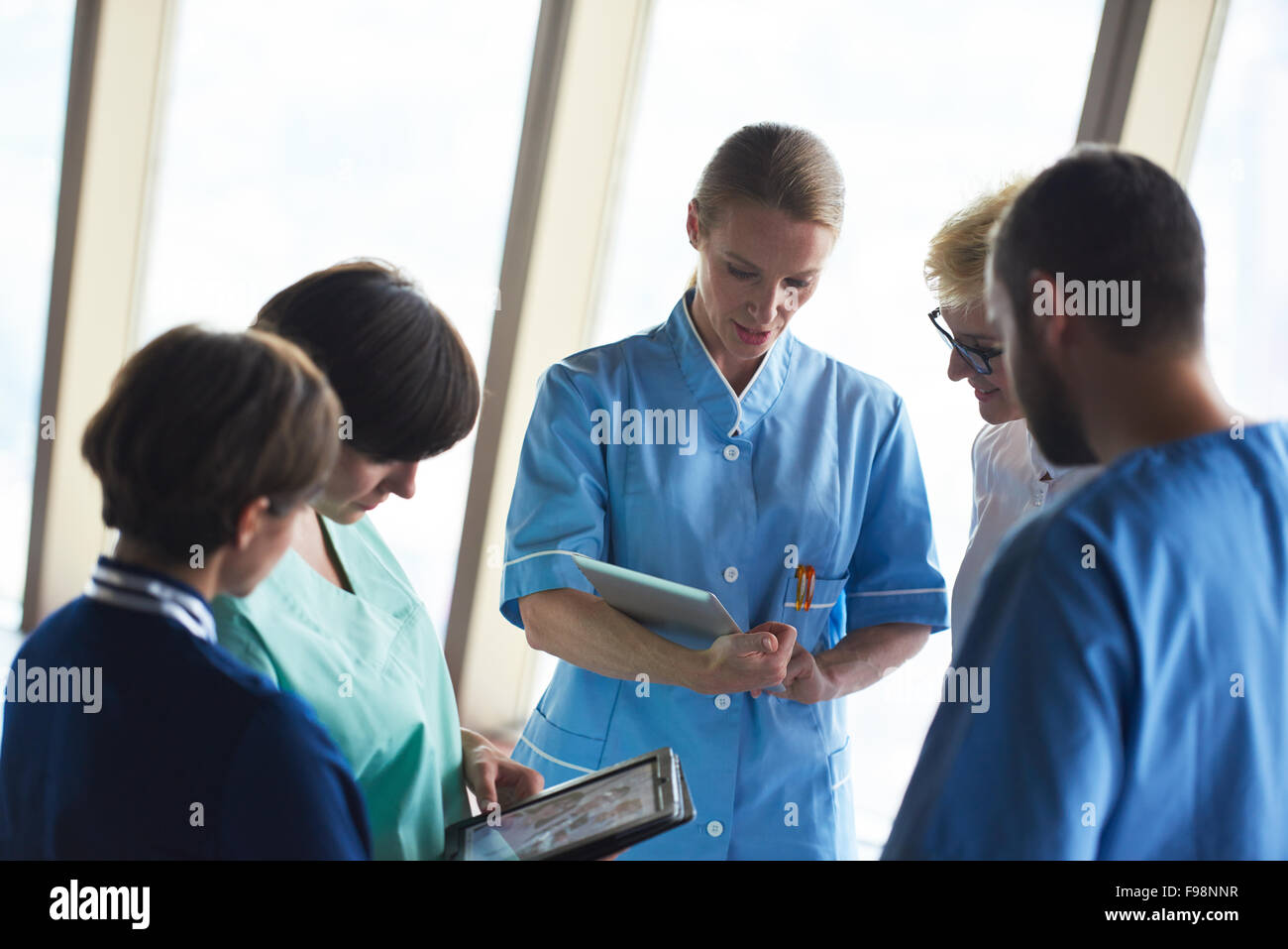 group of medical staff at hospital, doctors team standing together ...