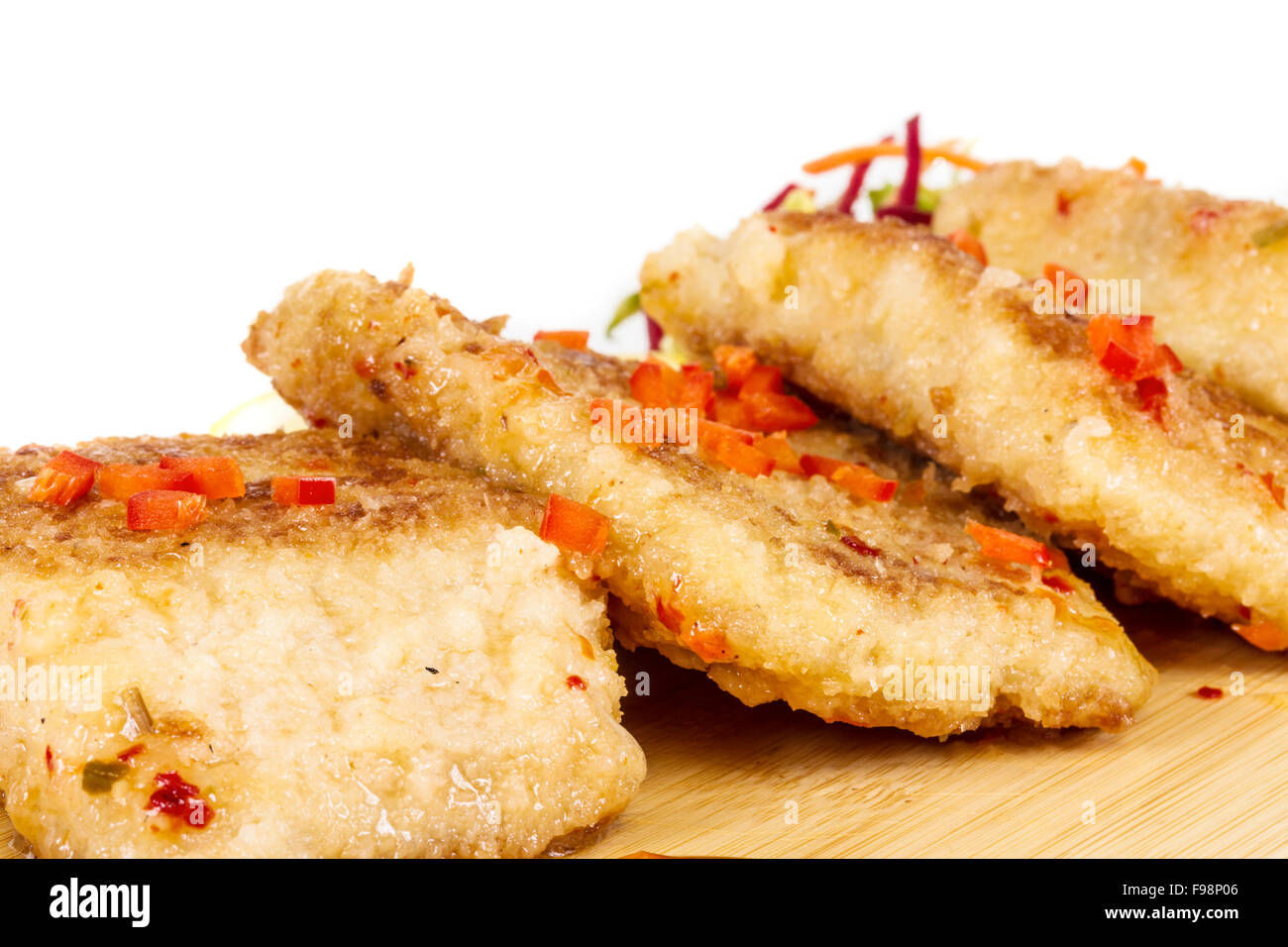 Fried fish fillets with salad Stock Photo - Alamy
