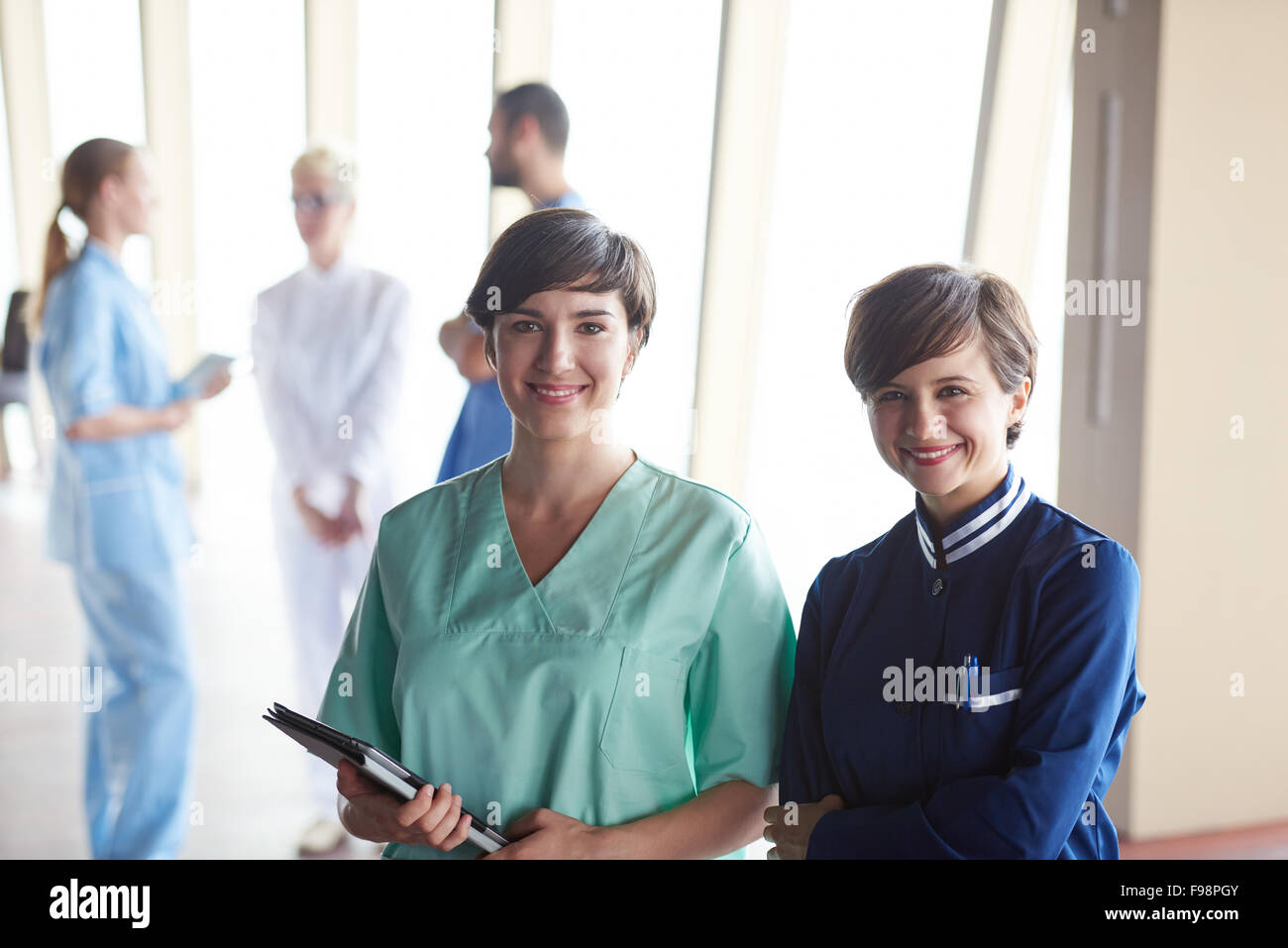group of medical staff at hospital, doctors team standing together ...
