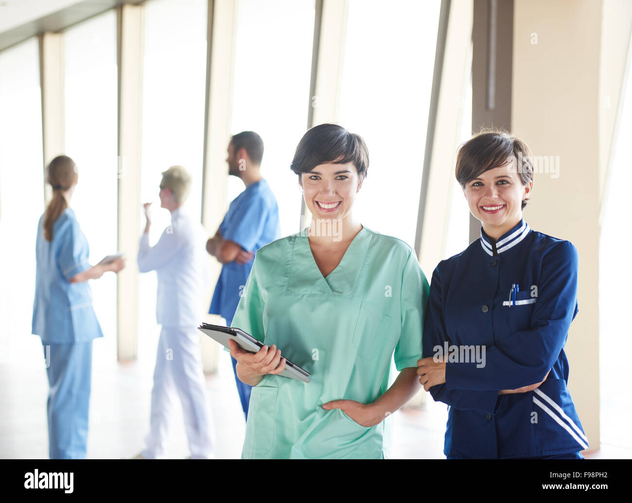 group of medical staff at hospital, doctors team standing together ...
