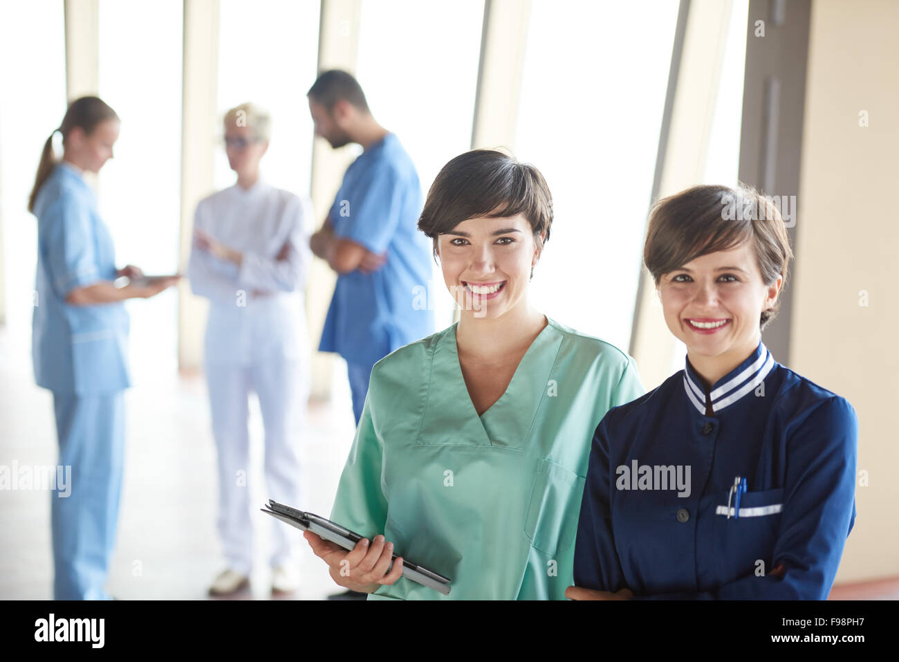 group of medical staff at hospital, doctors team standing together ...