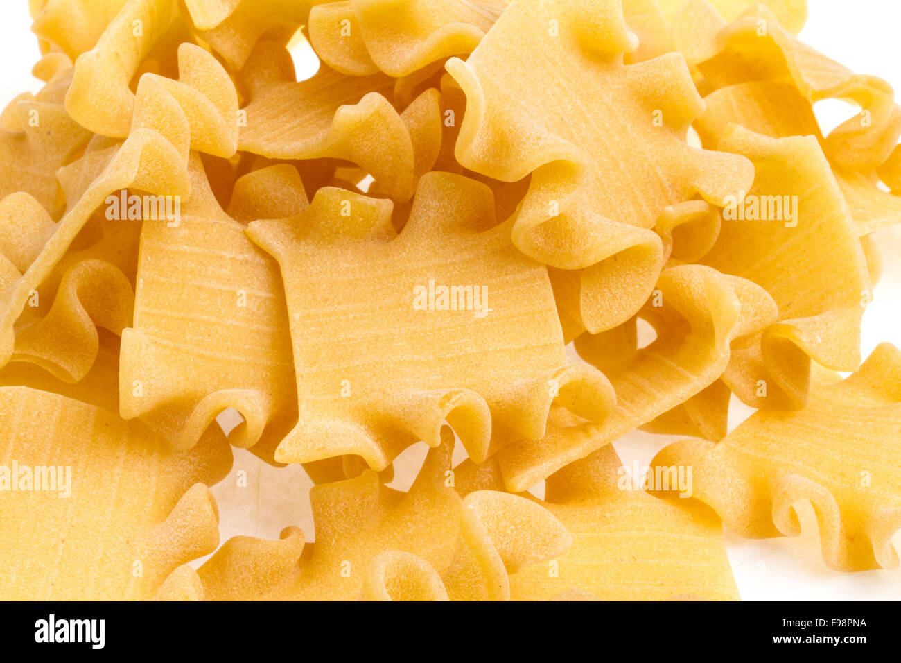 Raw yellow Italian pasta Stock Photo - Alamy