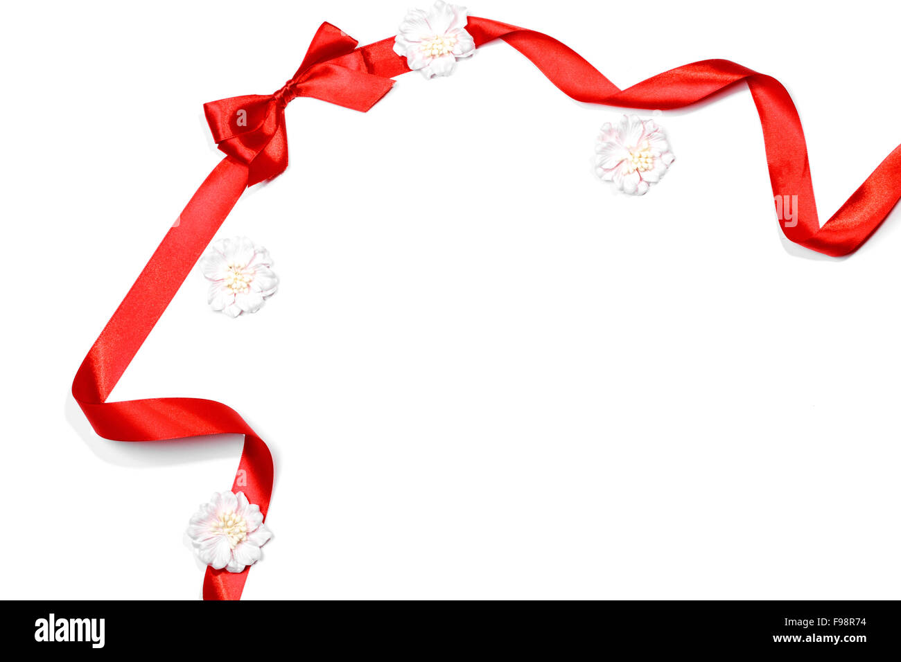 Red ribbons with bow Stock Photo - Alamy