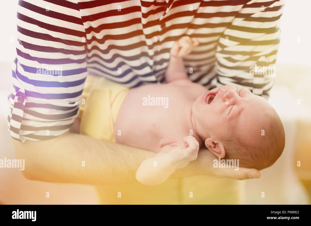 Father comforting crying child hi-res stock photography and images - Alamy