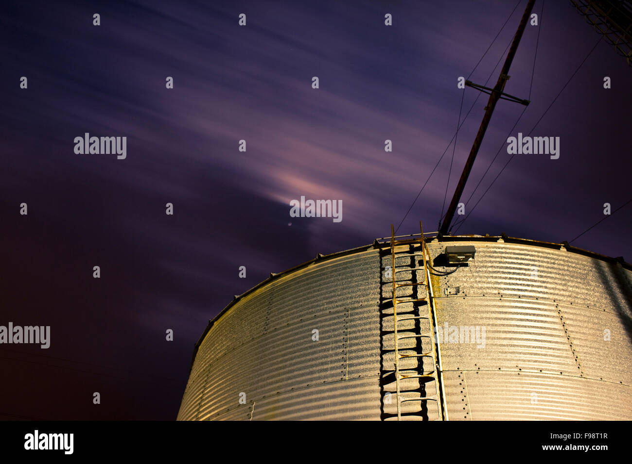 Large grain reservoir at night Stock Photo - Alamy