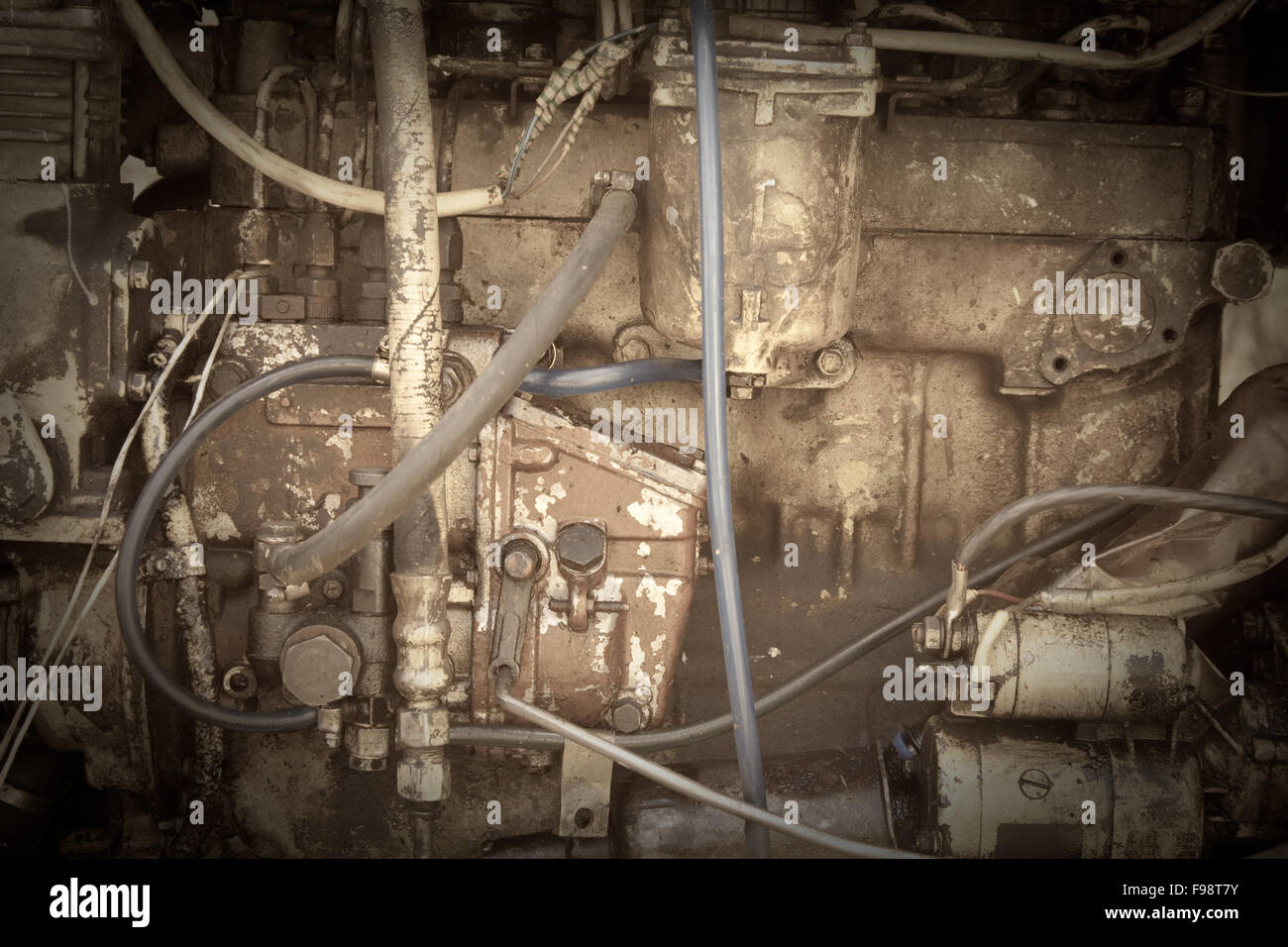 Vintage photo of battered old farm tractor engine Stock Photo - Alamy