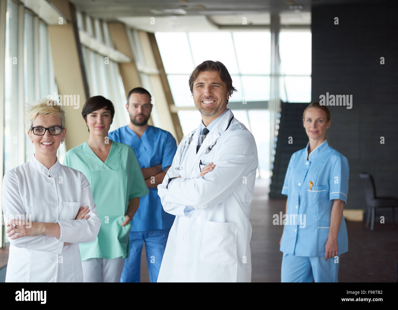 group of medical staff at hospital, doctors team standing together ...