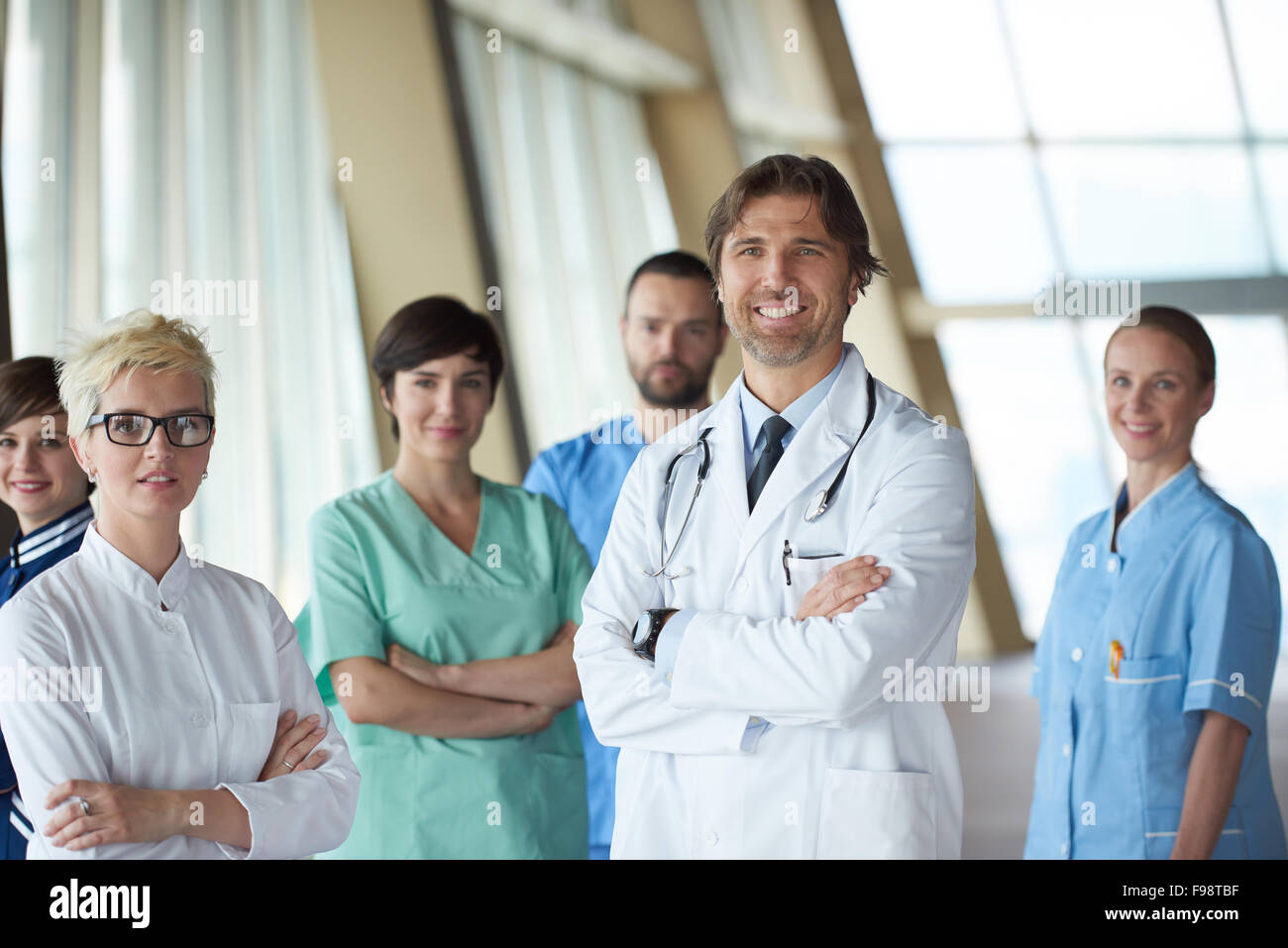 group of medical staff at hospital, doctors team standing together ...