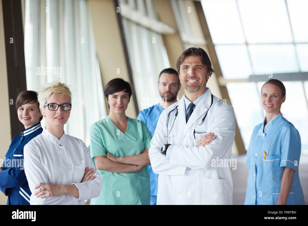group of medical staff at hospital, doctors team standing together ...