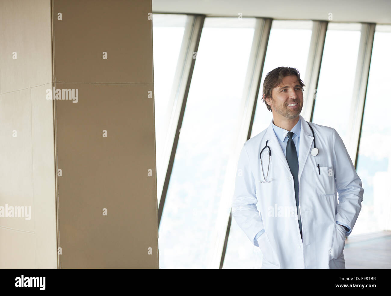handsome doctor portrait at modern hospital clinic indoors Stock Photo ...
