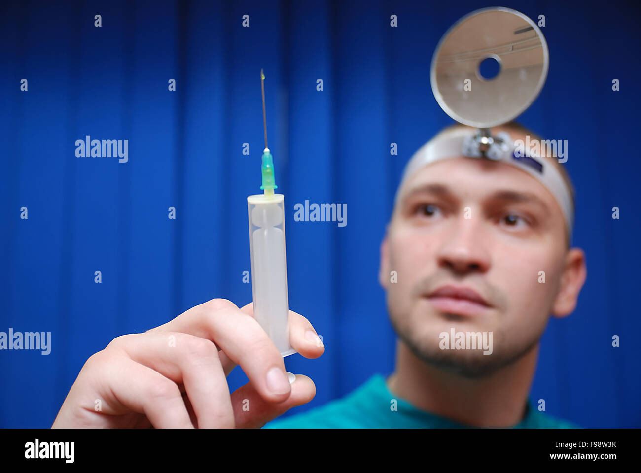 doctor with injection Stock Photo - Alamy