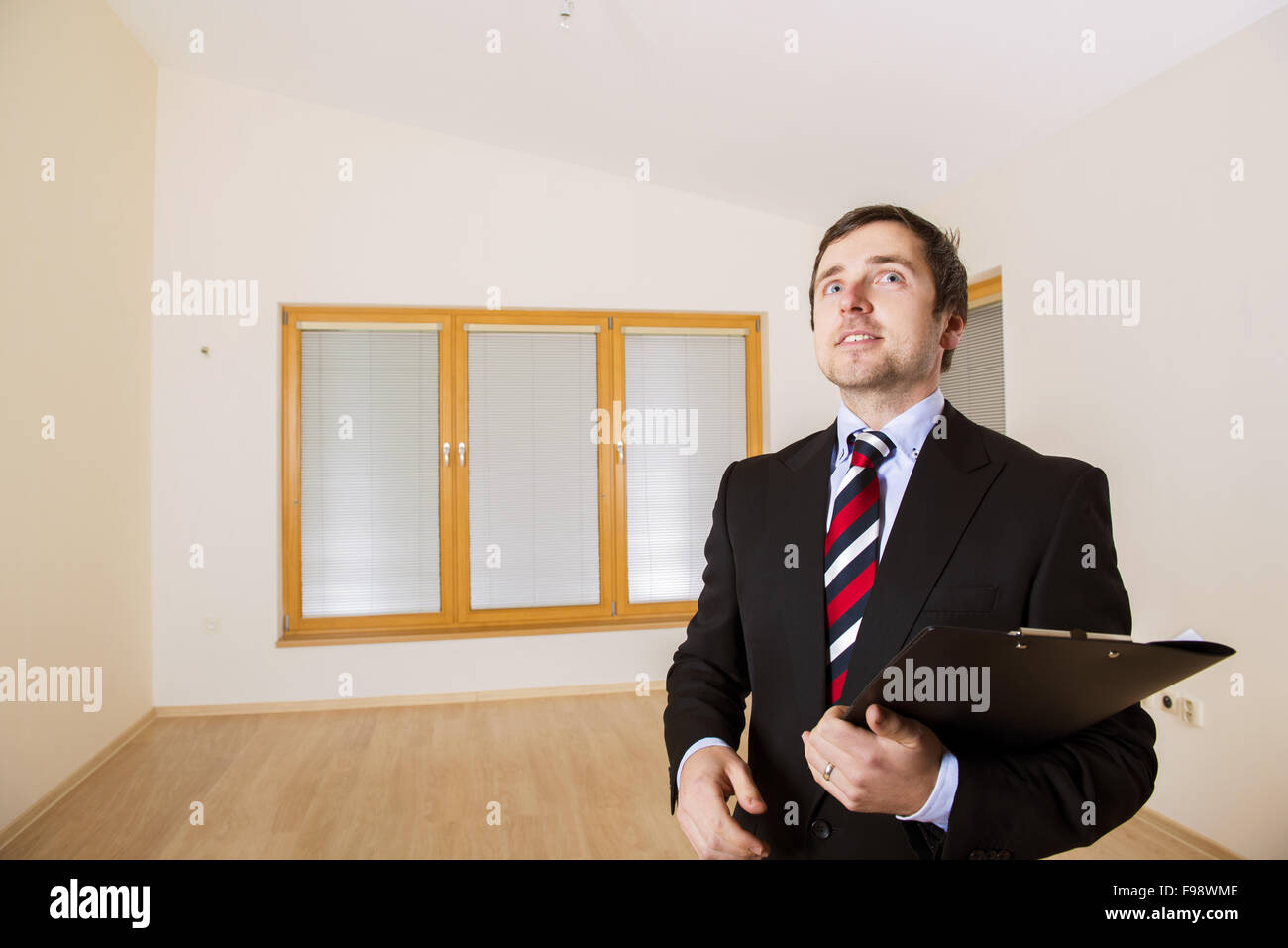 Man standing in empty house hi-res stock photography and images - Alamy