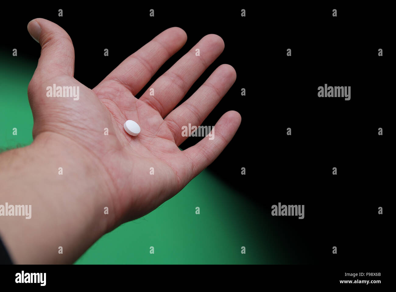 pills in hand Stock Photo - Alamy