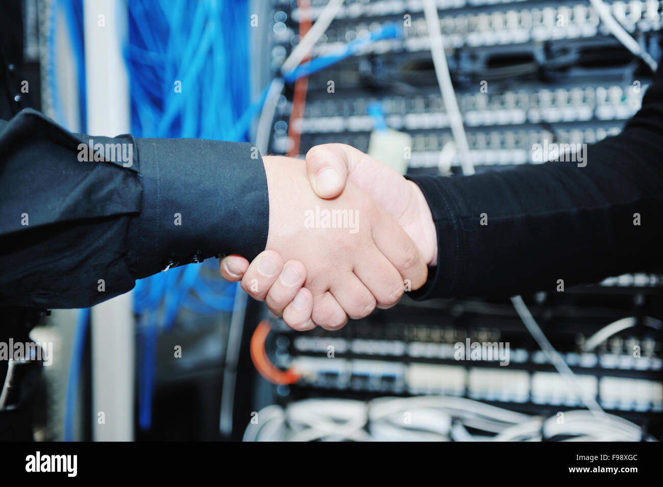 it engineer in network server room solving problems and give help and ...