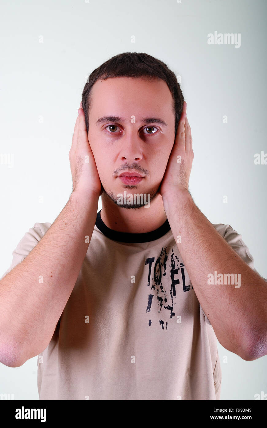 Handsome man expressing his inner feelings Stock Photo - Alamy