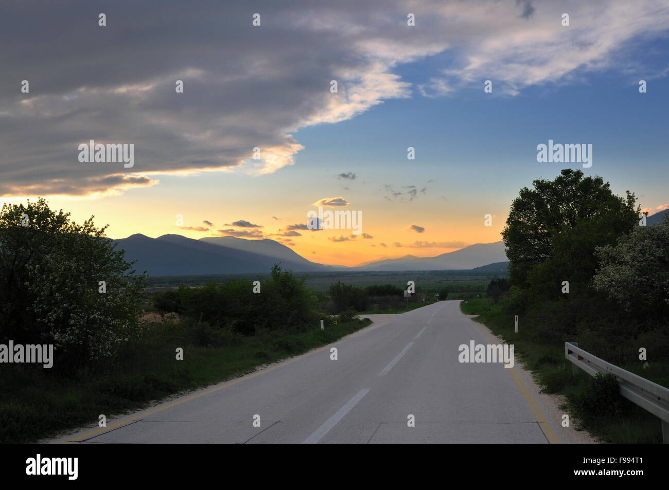 beautiful sunset in nature landscape with scenic colors Stock Photo - Alamy