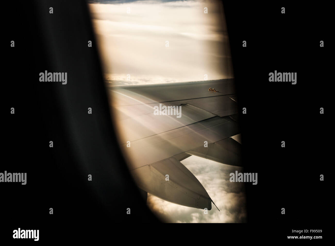 Detail of an airplane's wing while in flight Stock Photo - Alamy