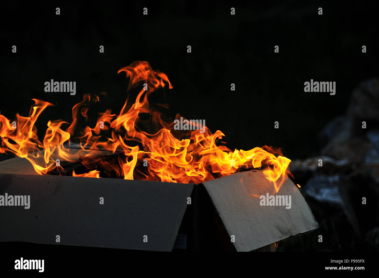 wild fire flames burn hot with black background Stock Photo - Alamy