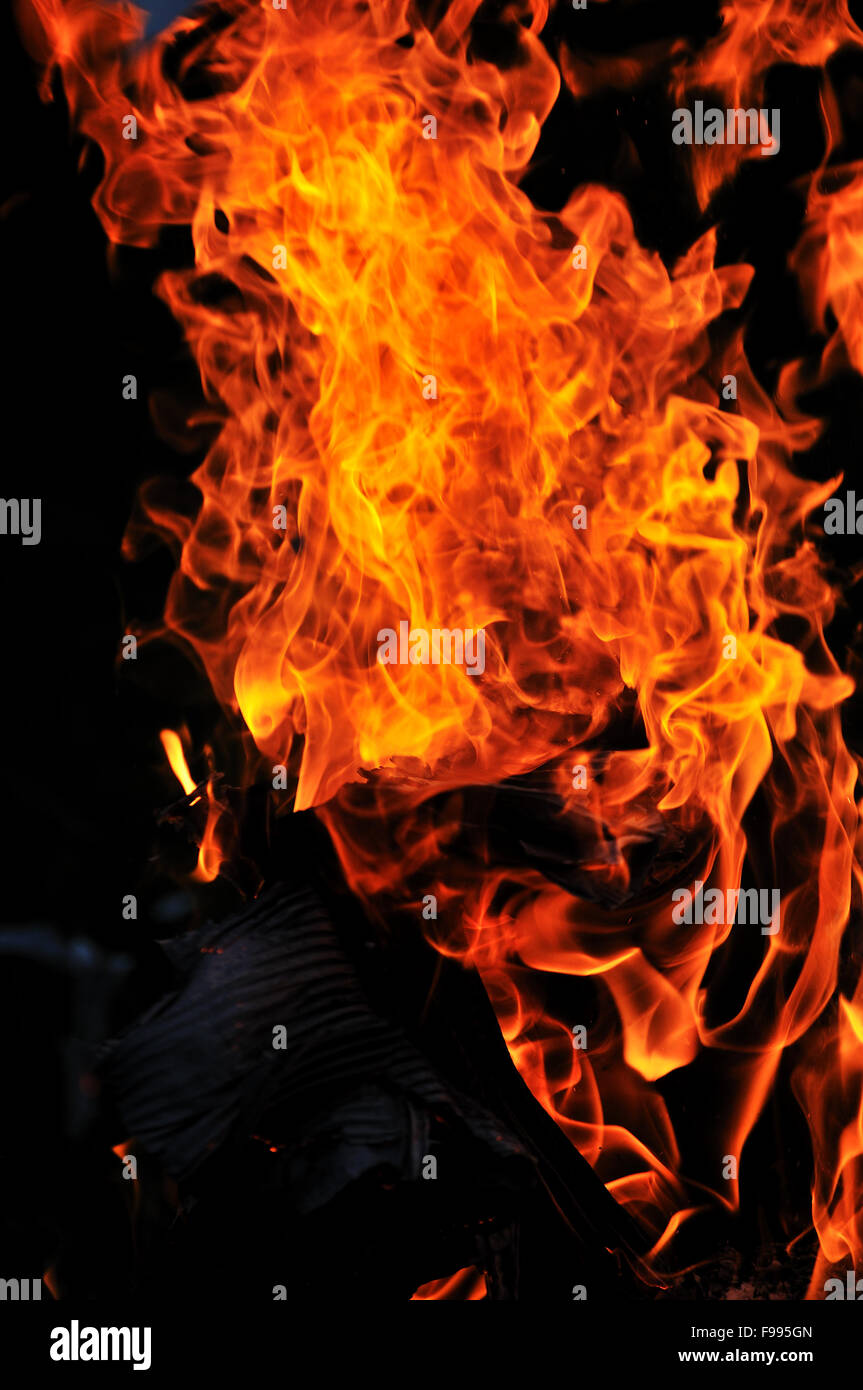 wild fire flames burn hot with black background Stock Photo - Alamy