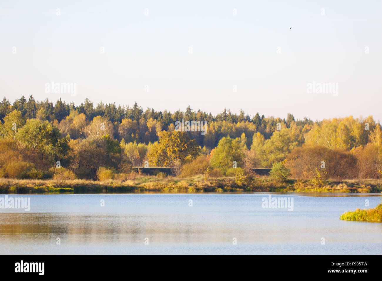 Colorful autumn trees fortress at the river front Stock Photo - Alamy