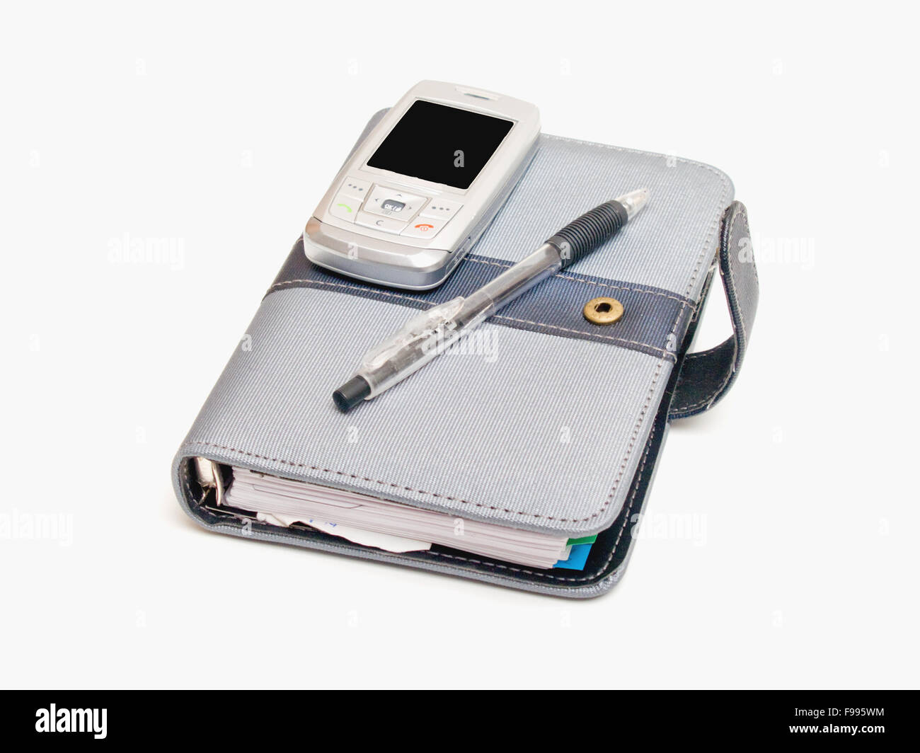Business tools - Pen diary and a cell phone Stock Photo - Alamy