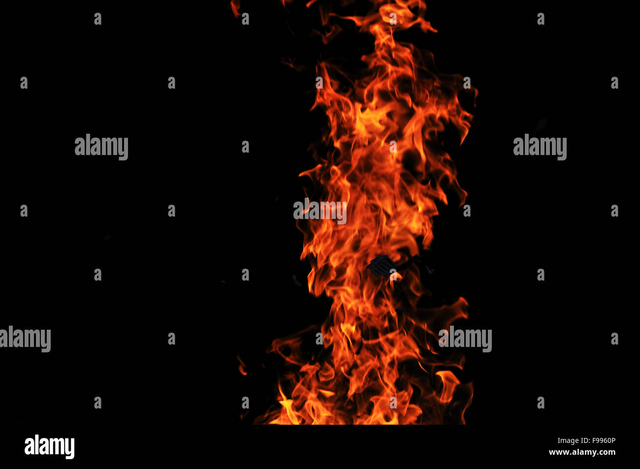wild fire flames burn hot with black background Stock Photo - Alamy