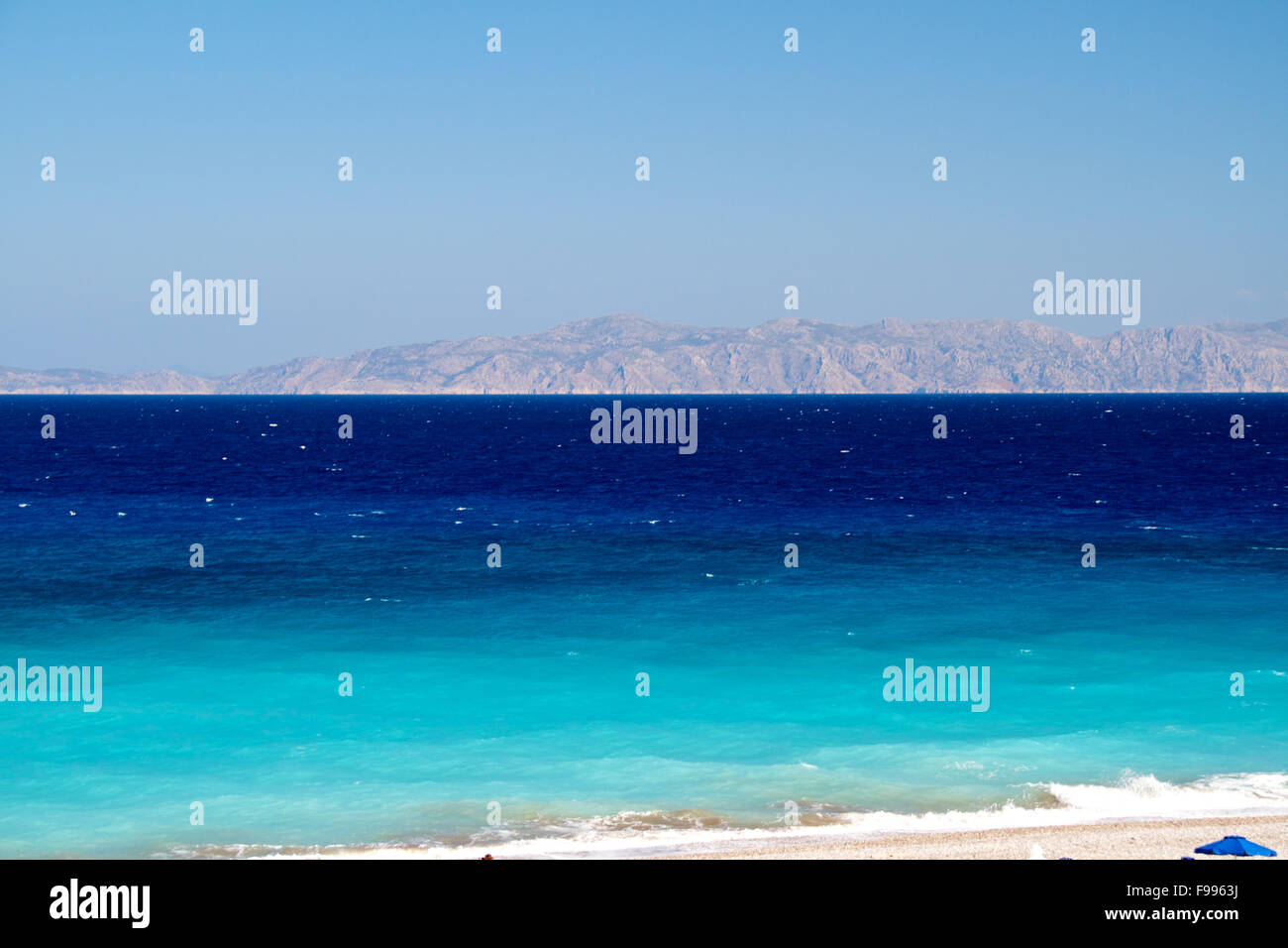 Picturesque beach on Rhodes Stock Photo - Alamy