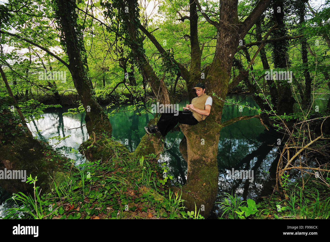 man outdoor in nature relaxing Stock Photo - Alamy
