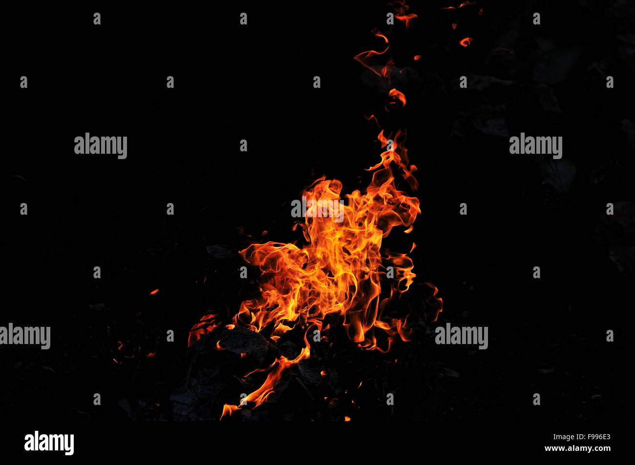 wild fire flames burn hot with black background Stock Photo - Alamy