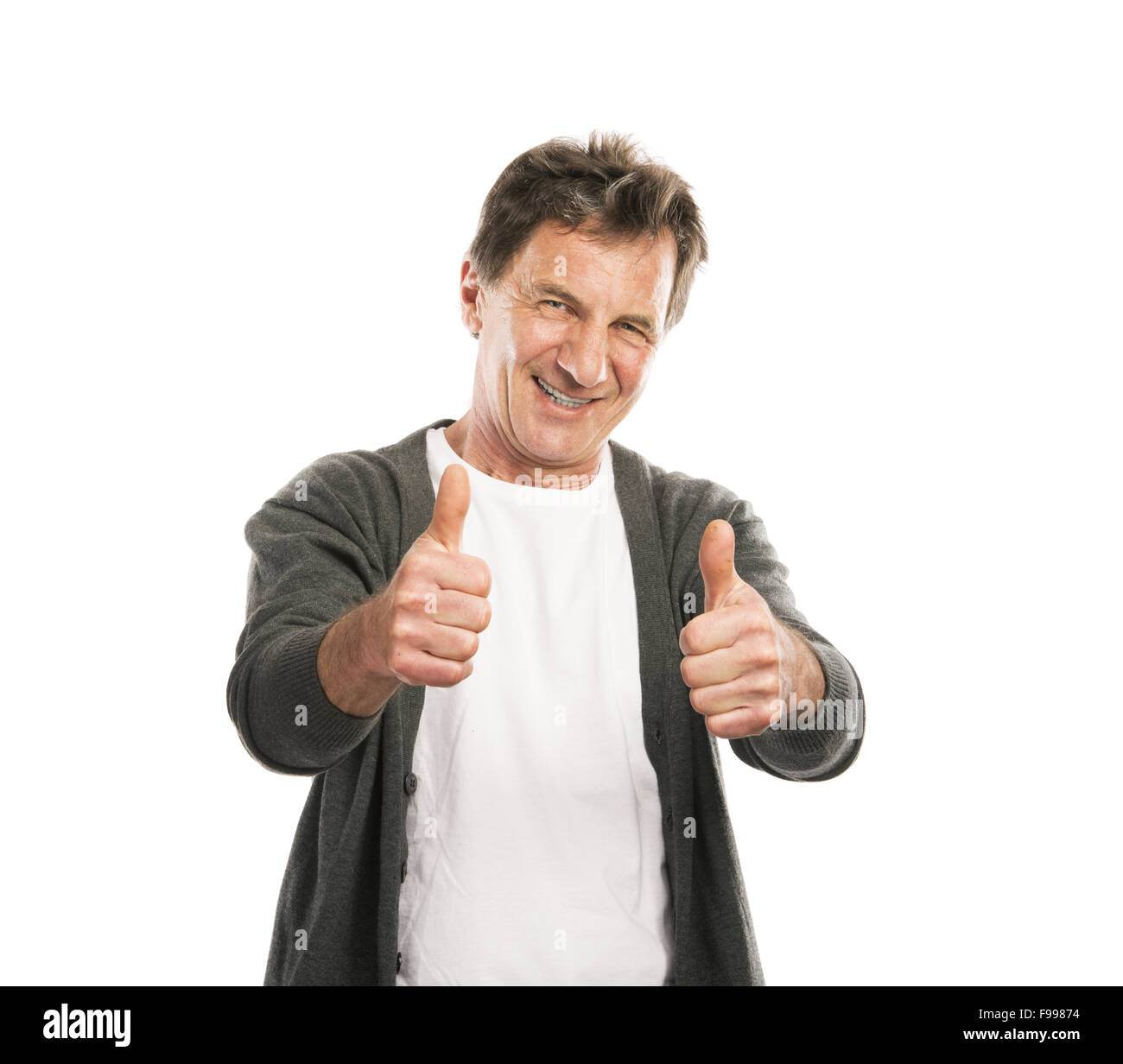 Portrait of a happy senior man with thumbs up isolated on white ...