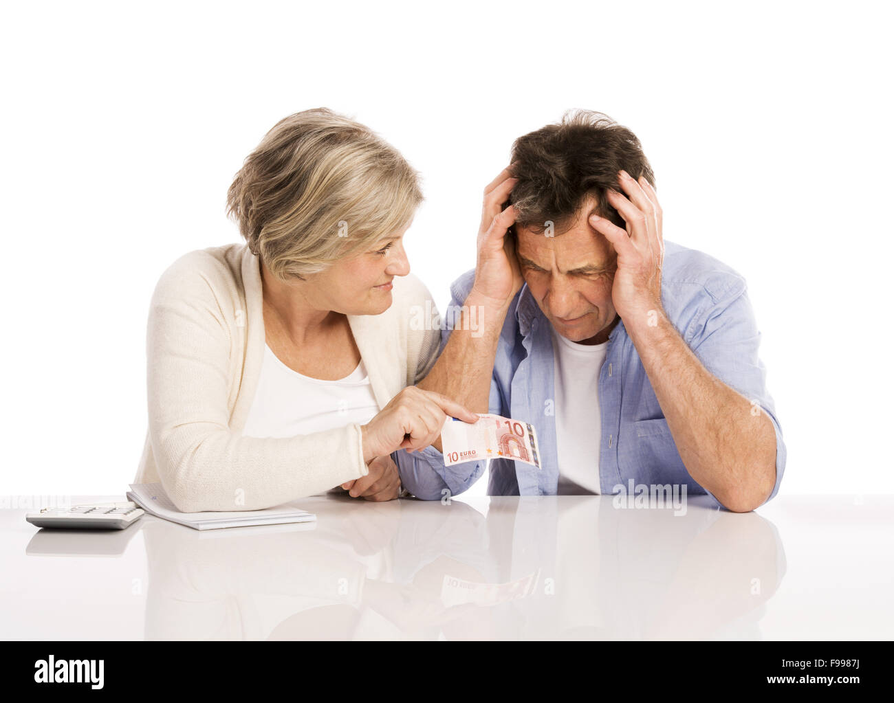 Senior couple with empty wallet discussing financial issues, isolated ...