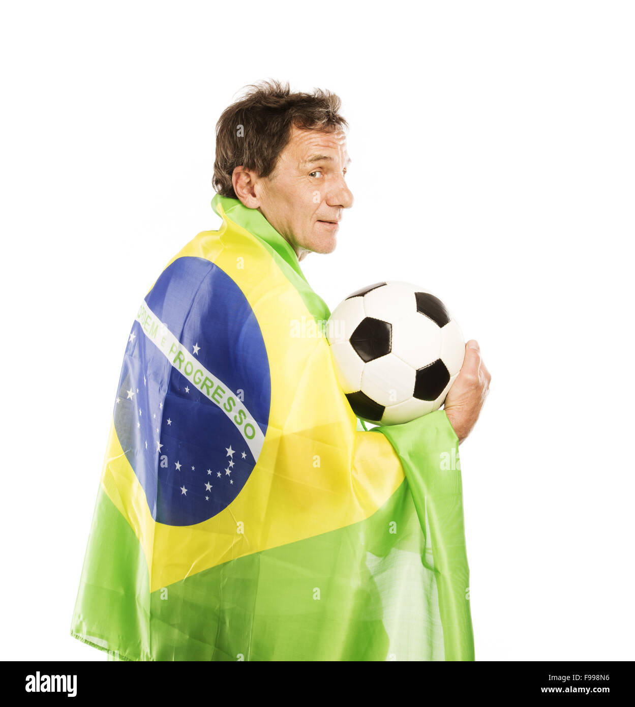 Brazilian senior soccer fan holding ball and flag of Brazil, isolated ...
