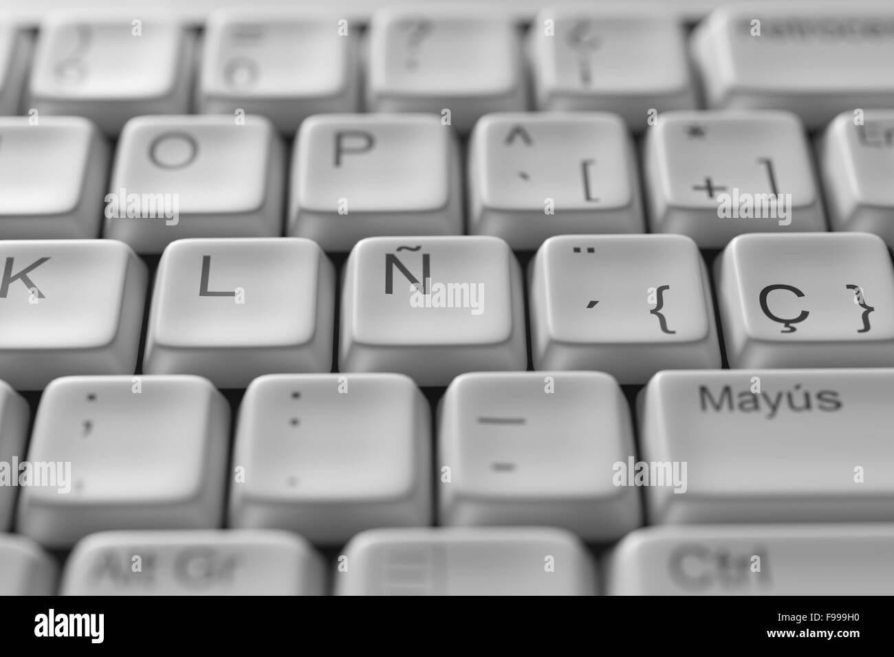 3d rendering of a close-up of white spanish keyboard on wooden table ...